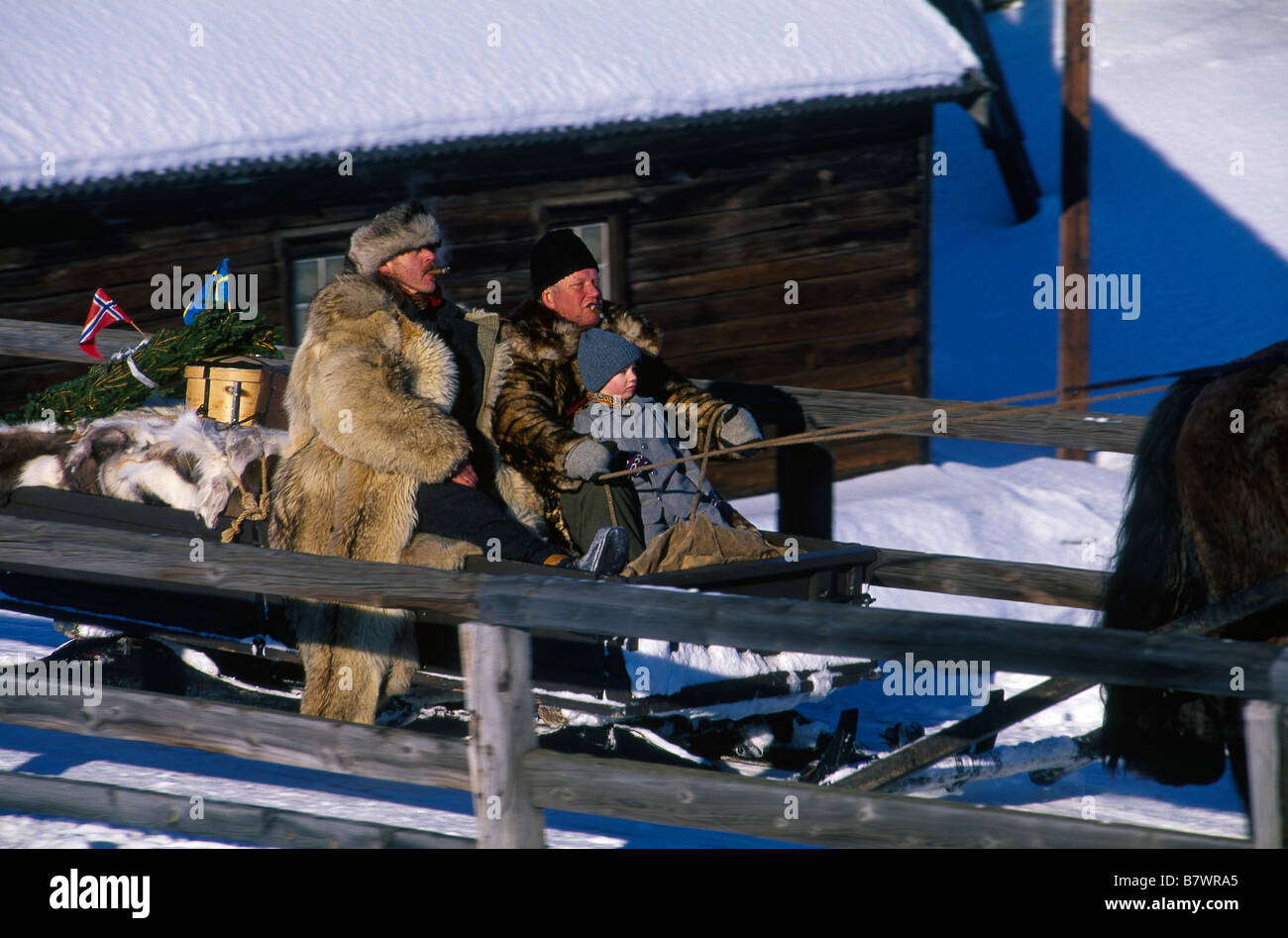 Winter Town houses Market Large crowd of people People riding on ...
