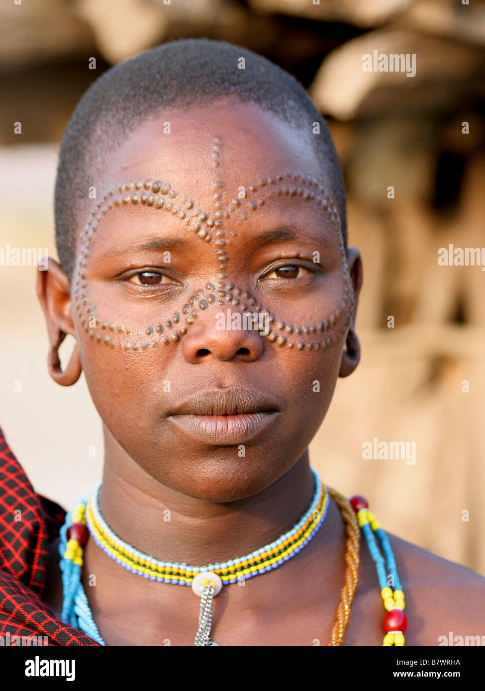 Africa Tanzania members of the Datoga tribe Woman in traditional dress ...