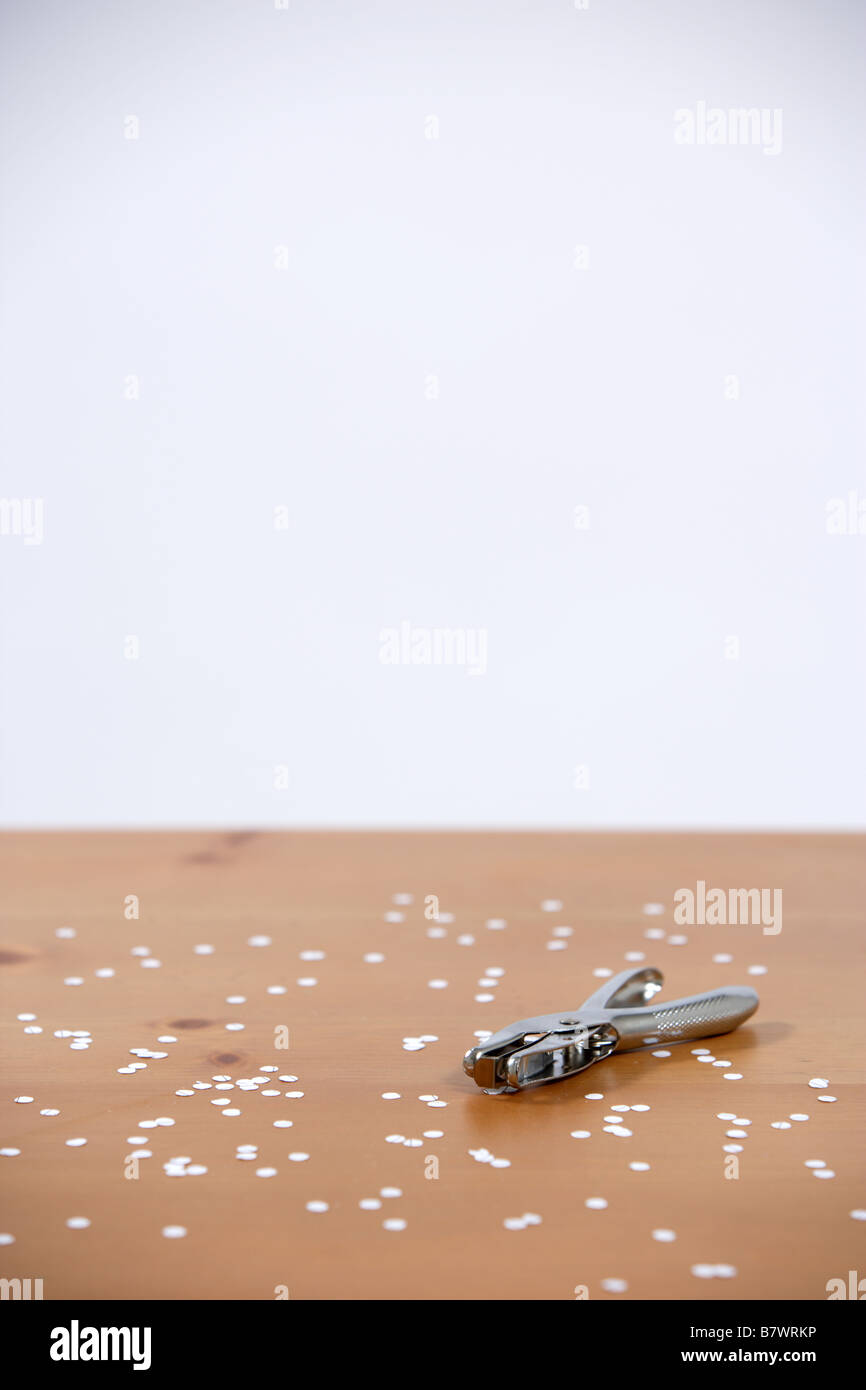 A Hole Punch on a desk in an office Stock Photo - Alamy