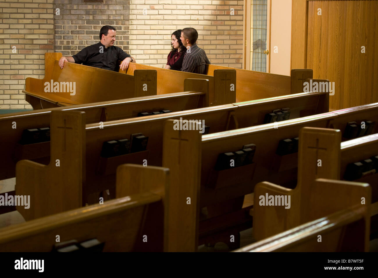 Priest And Woman Talking High Resolution Stock Photography and Images ...