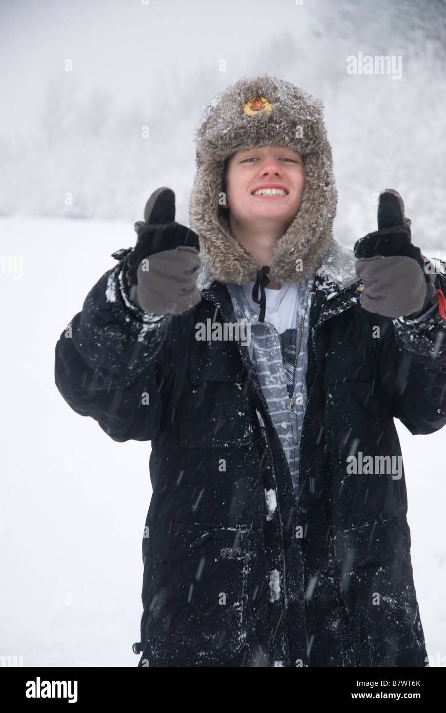 Teenager in the Snow Stock Photo - Alamy
