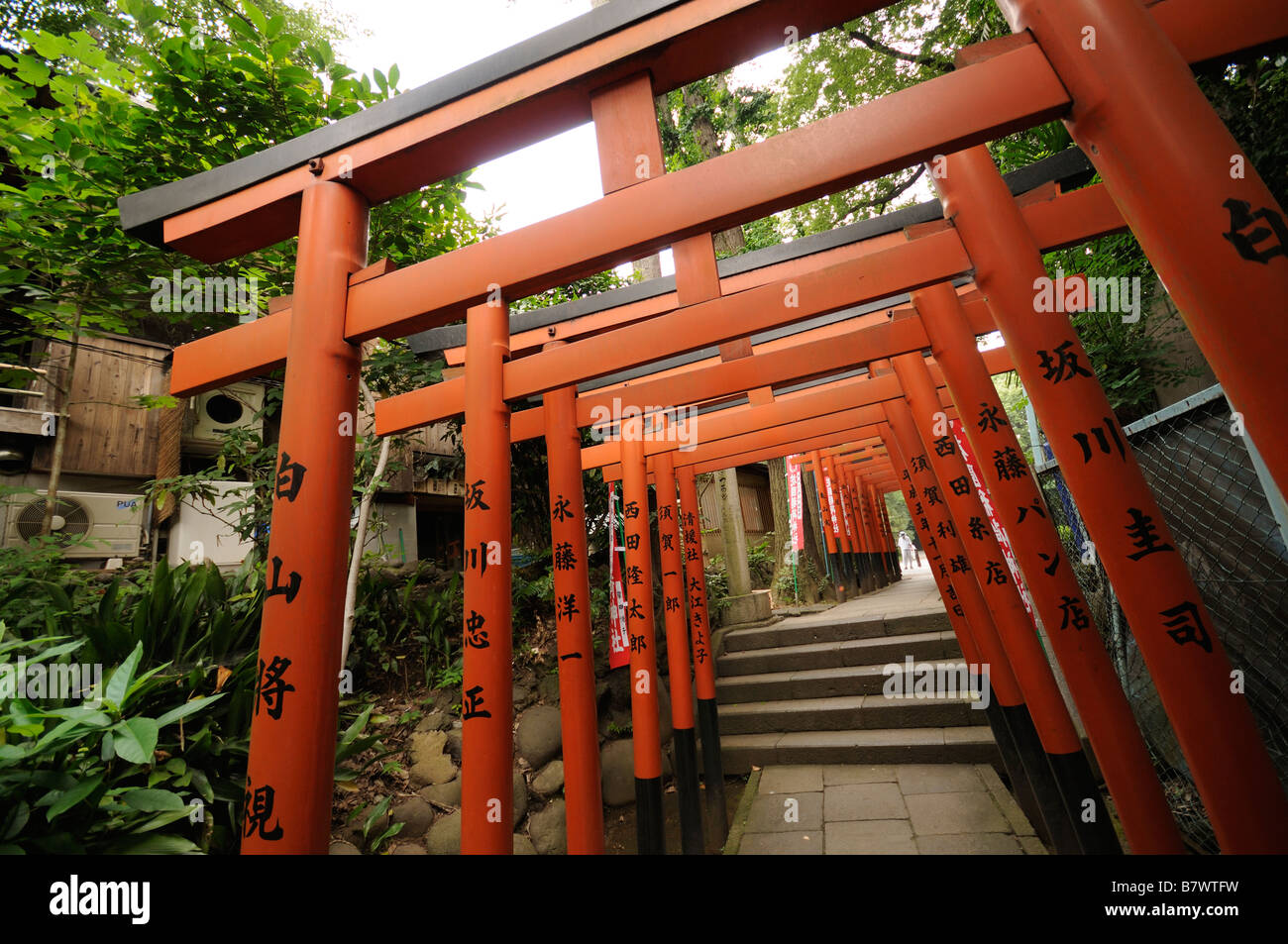 Access path by vermilion wooden torii. Gojo Tenjin Shinto Shrine. Ueno ...