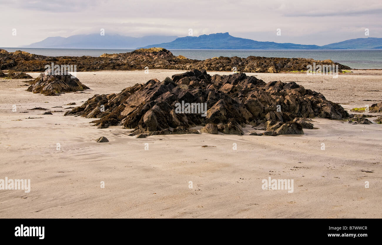 Dramatic Ardnamurchan beach scene with sand and rocks at Achateny Bay ...