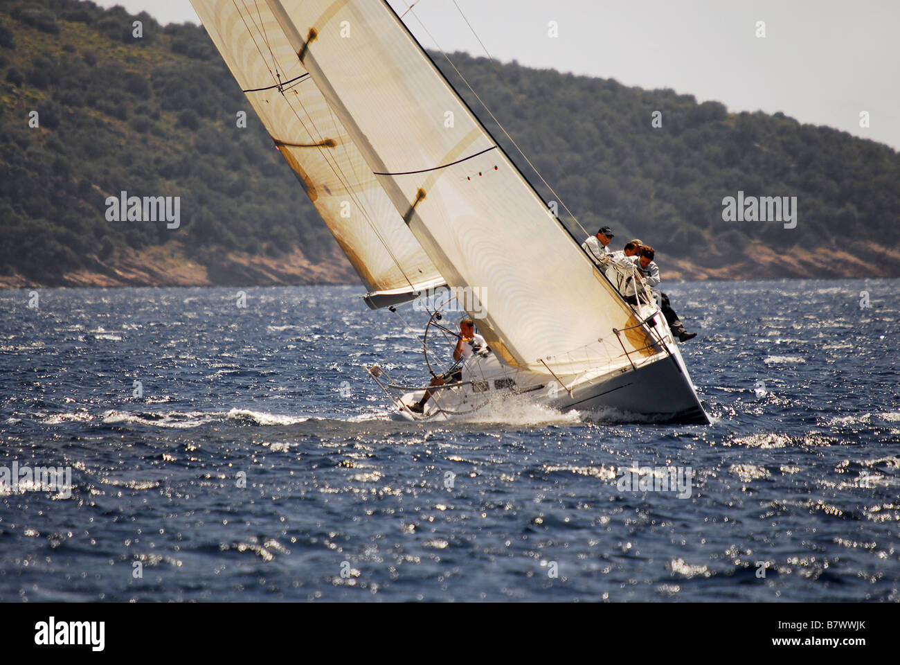 x type sailing boat on race Stock Photo - Alamy