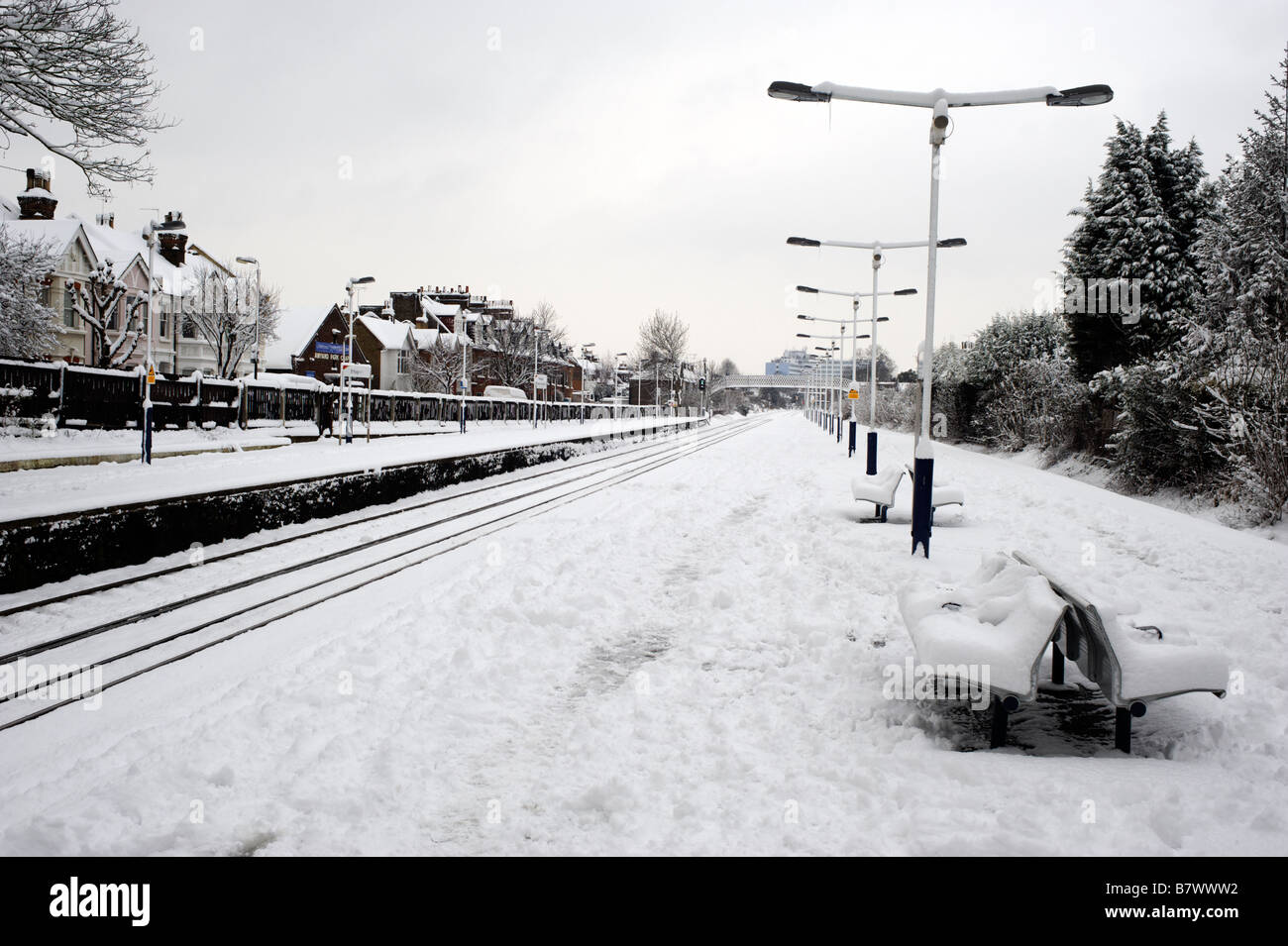Empty train station as rail services stop in the snow Stock Photo - Alamy