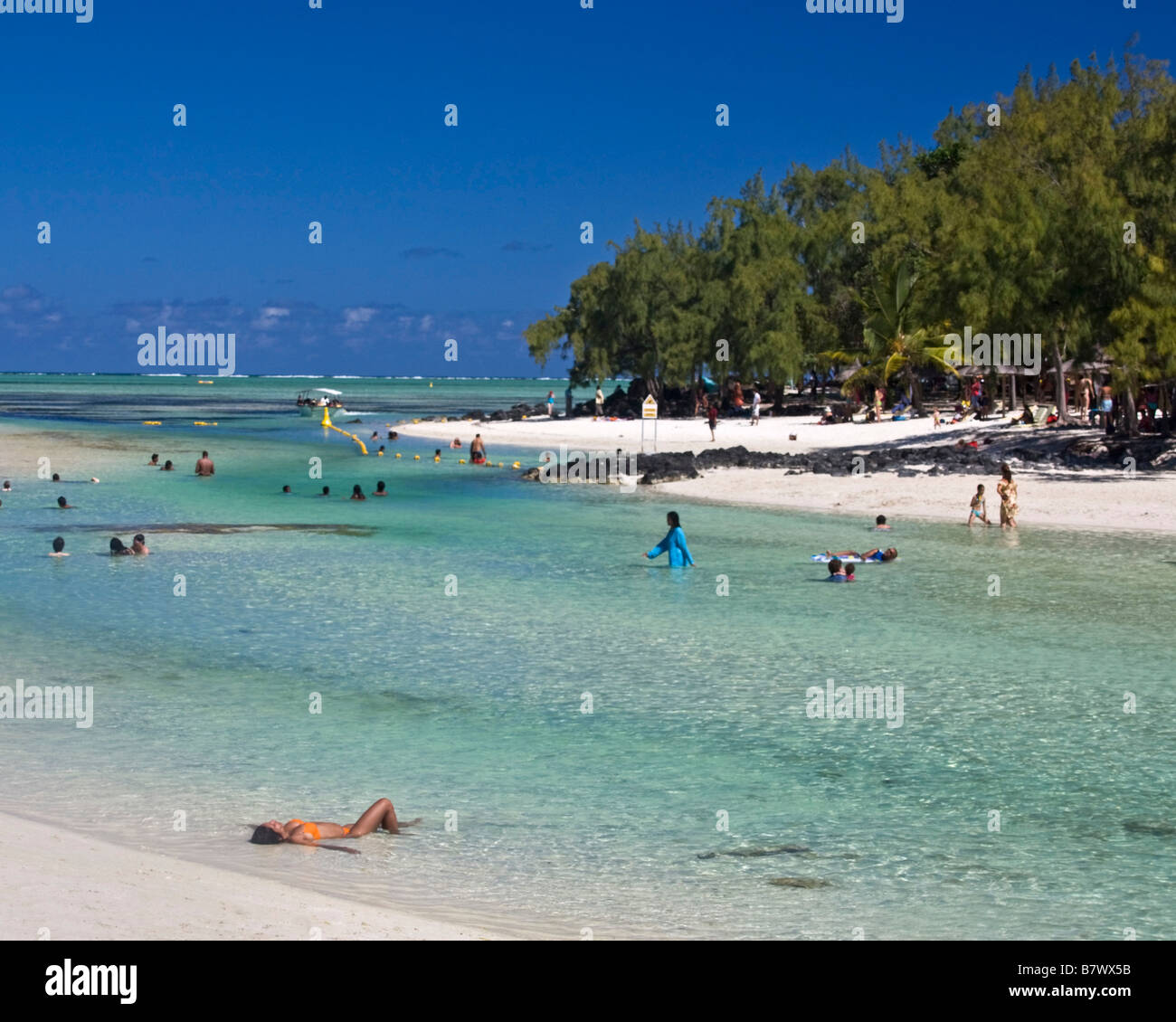 Mauritius island beach sunbathing hi-res stock photography and images ...