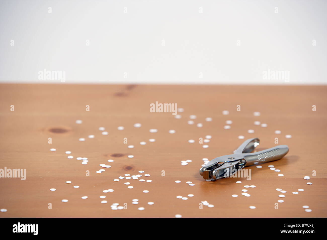 A Hole Punch on a desk in an office Stock Photo - Alamy
