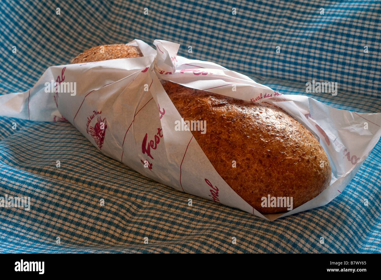 French "Pain Complet" / Wholemeal Loaf in paper wrapping - France Stock ...