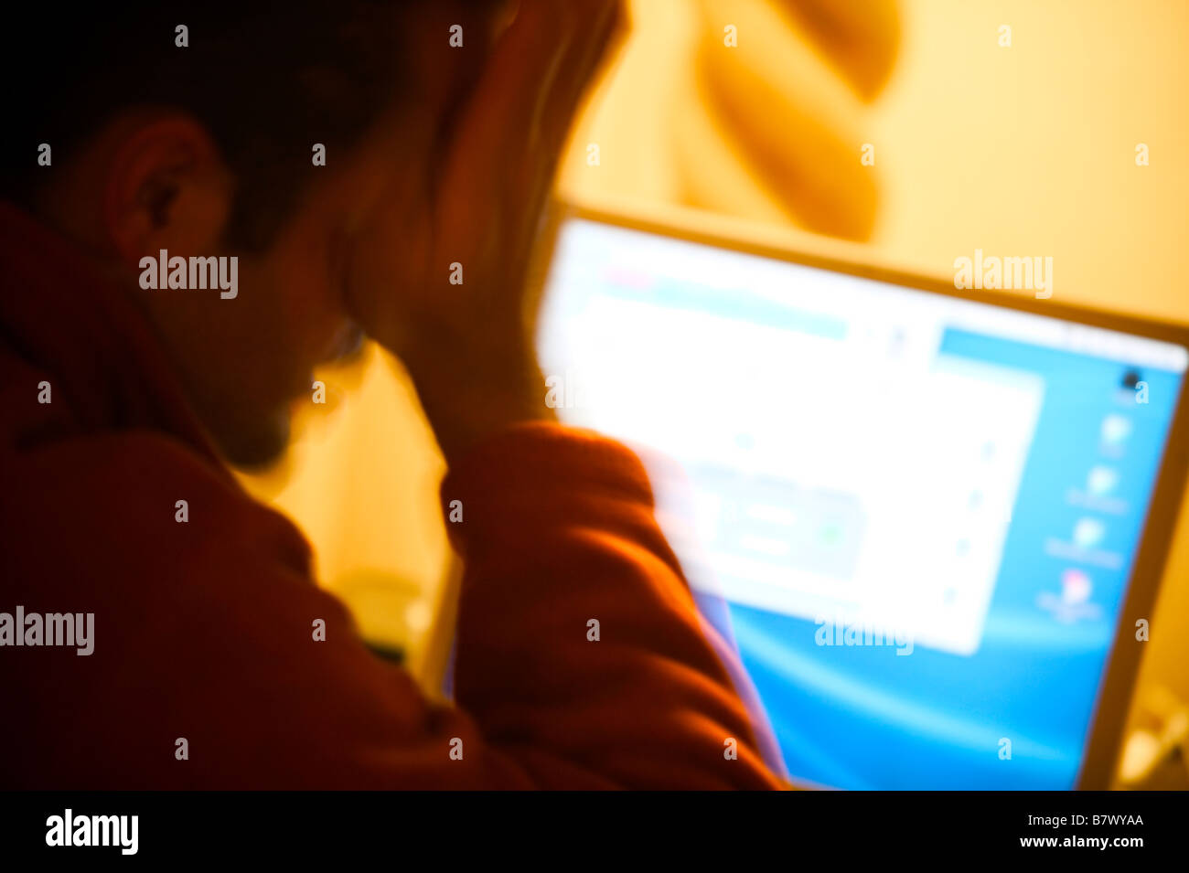 Man using laptop computer Stock Photo - Alamy