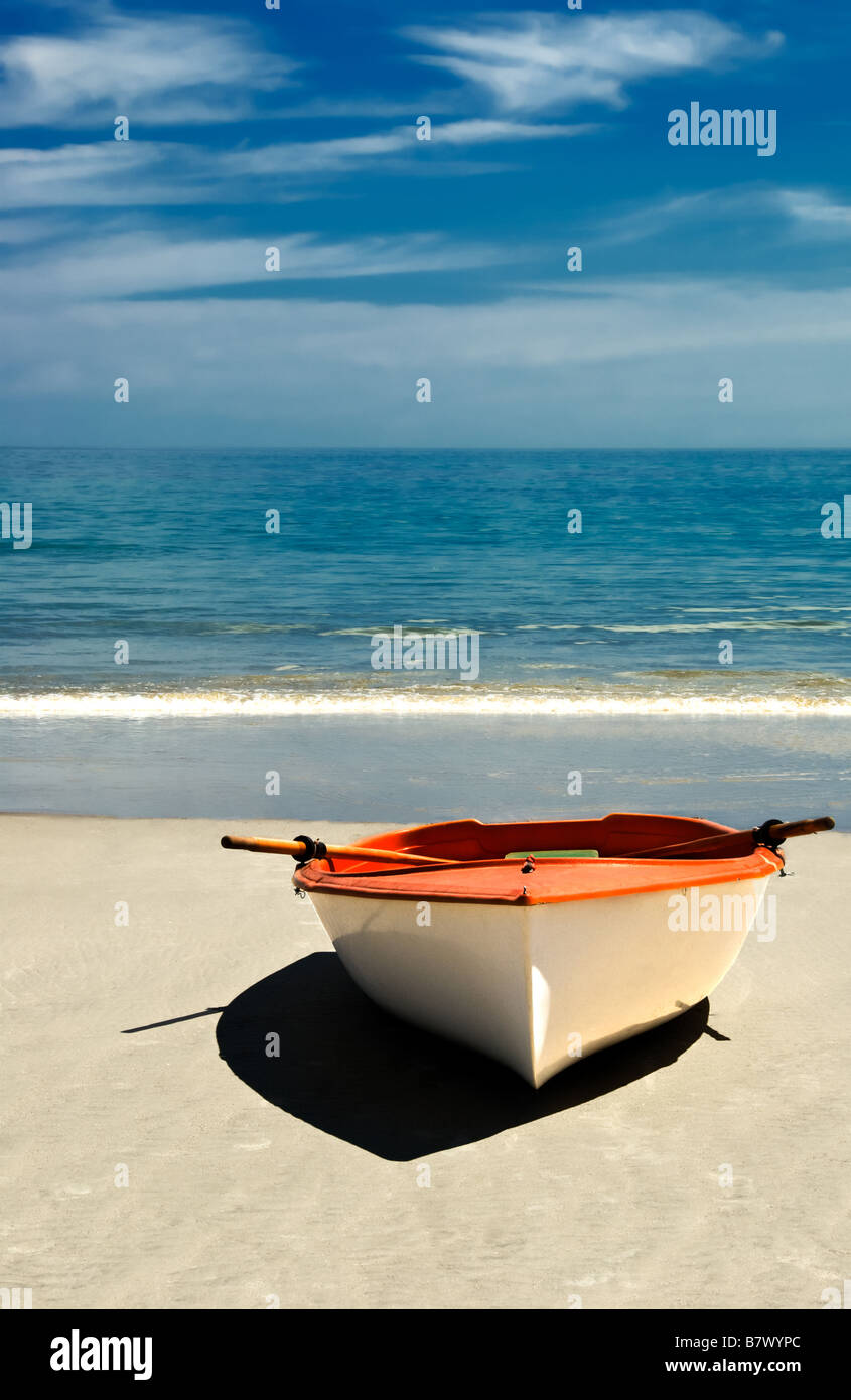 A row boat on the beach Stock Photo - Alamy