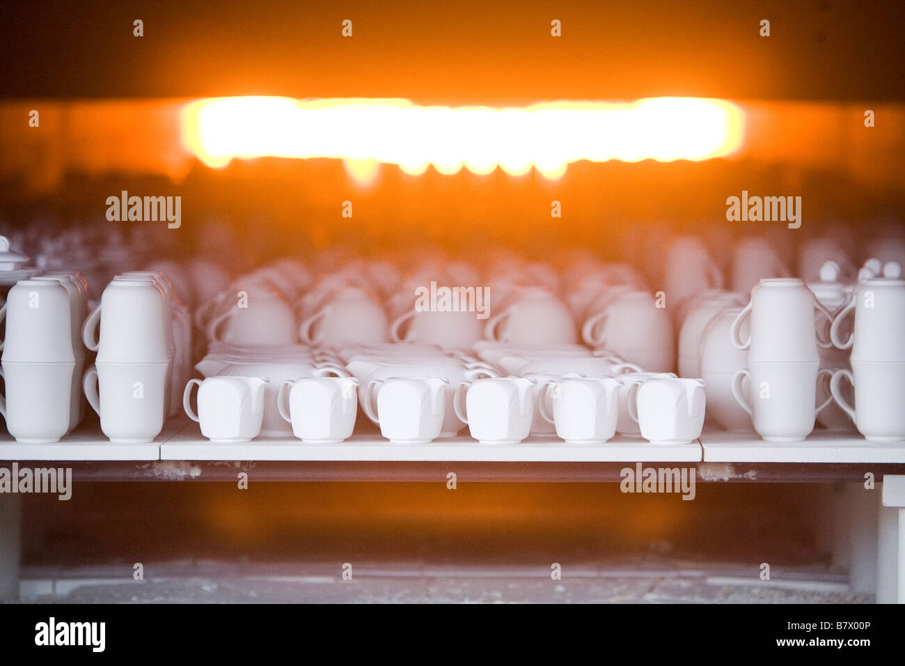 Pottery teapots and cups enter a blasting furnace at Steelite ...