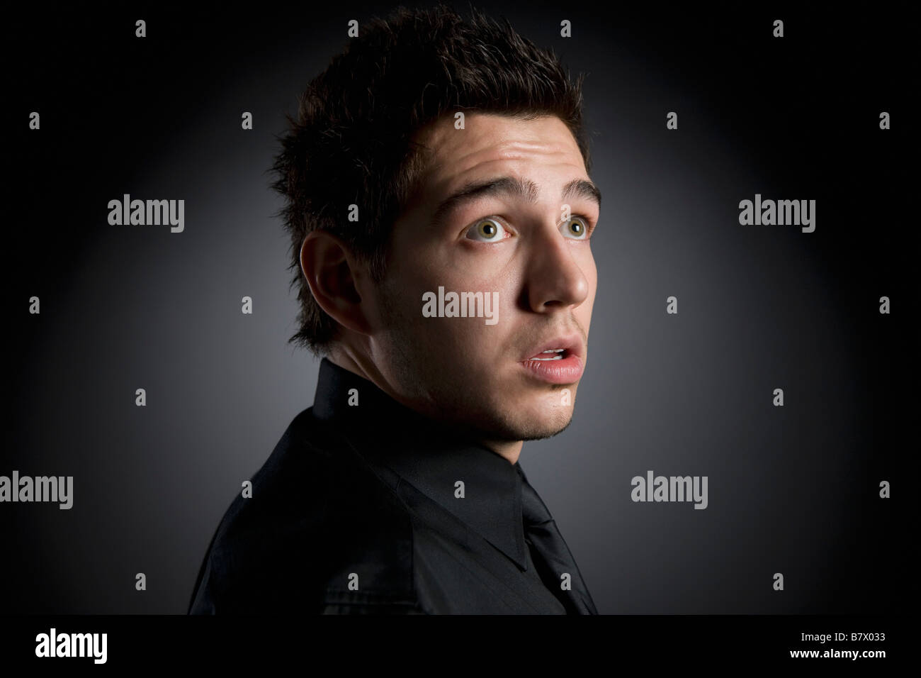Man with look of surprise Stock Photo - Alamy