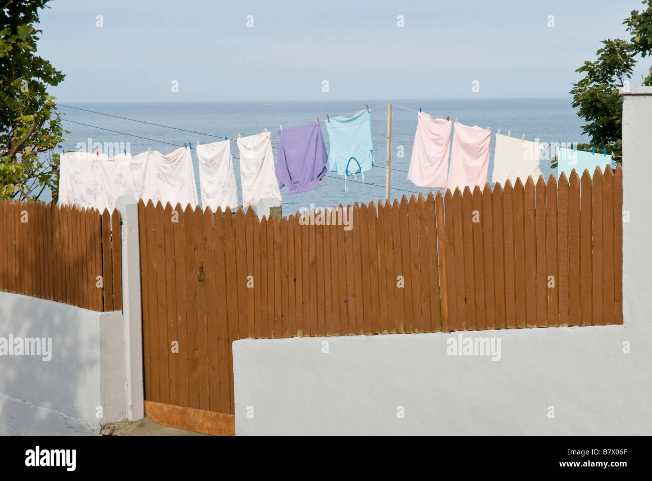 Clothesline behind wooden fence, Howth Peninsula, Dublin Ireland ...