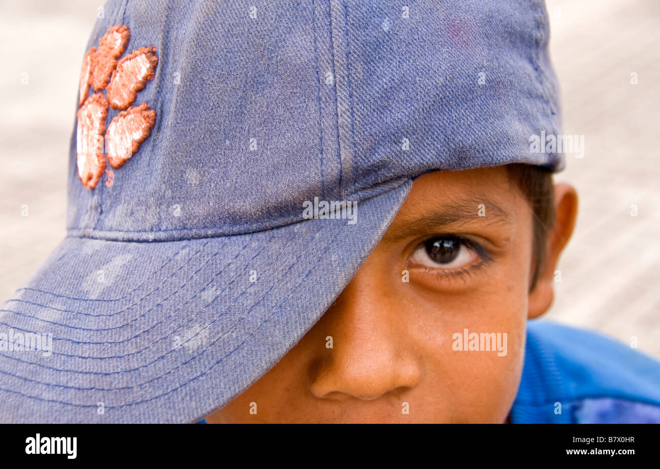 Granada, young boy wearing baseball cap Stock Photo - Alamy