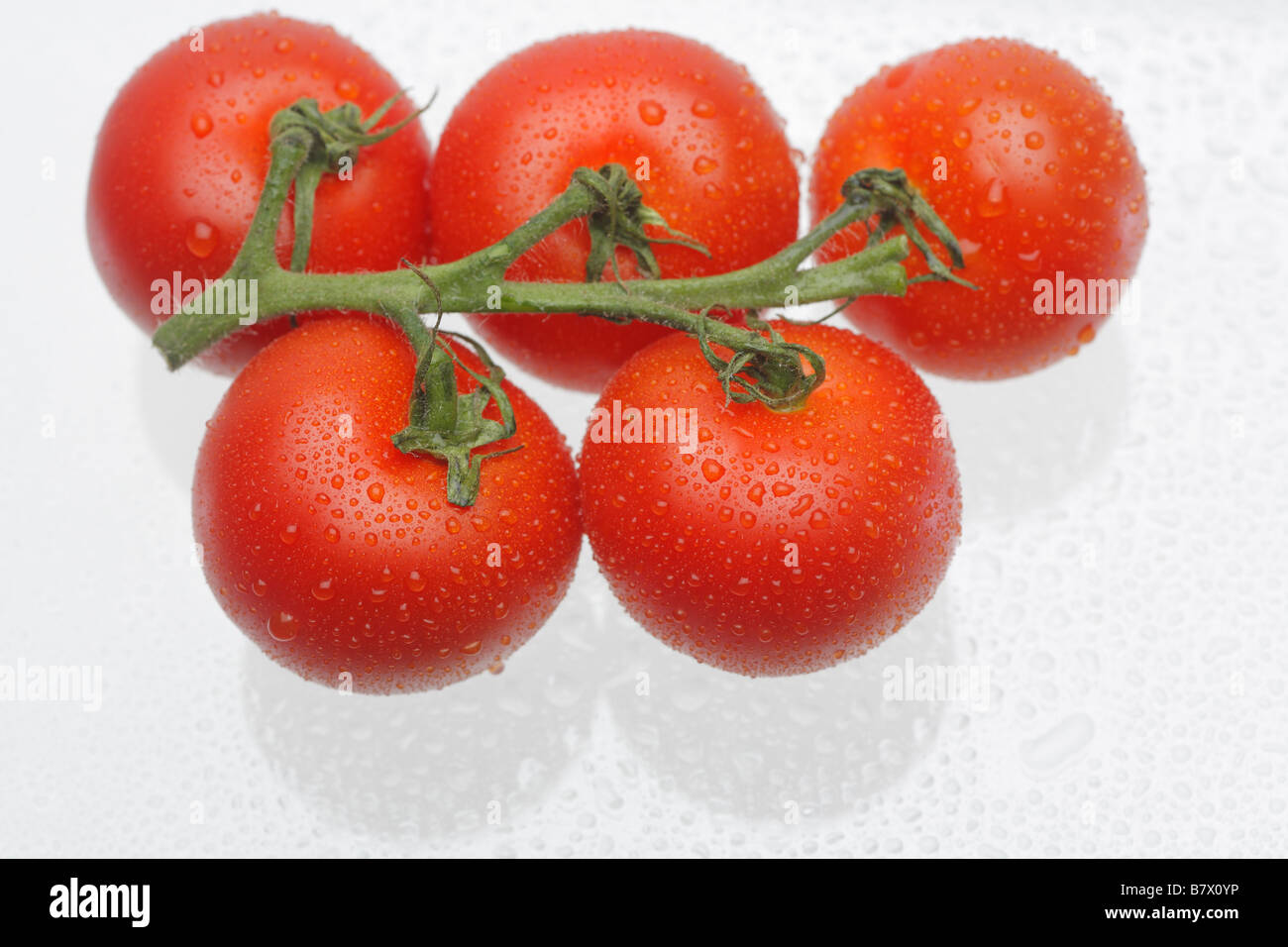 Cherry tomatoes, studio shot Stock Photo - Alamy
