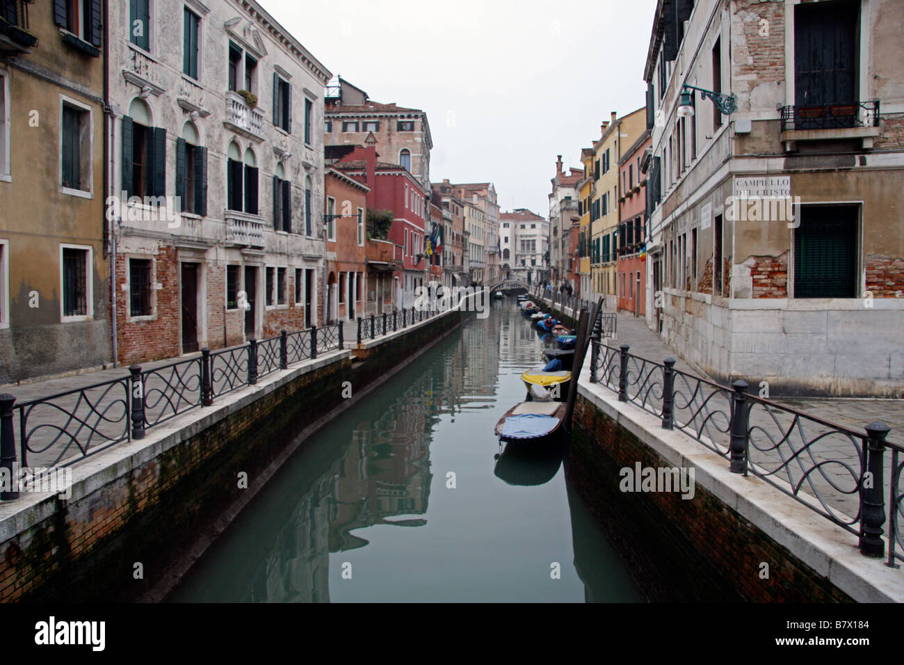 Waterway with several small boats Venice, Italy Stock Photo - Alamy