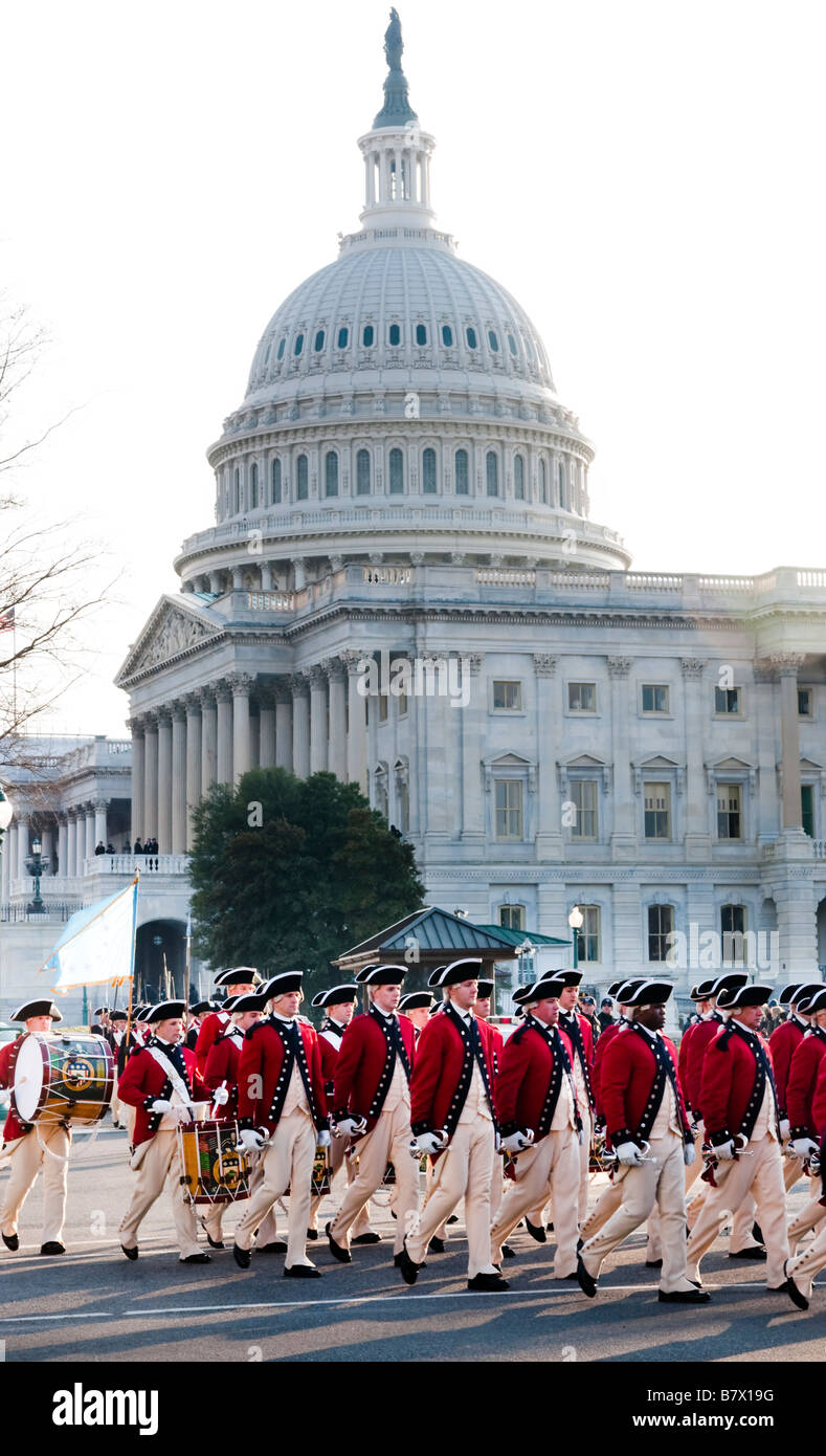 A formation of marchers in colonial garb march past the US Capitol in ...