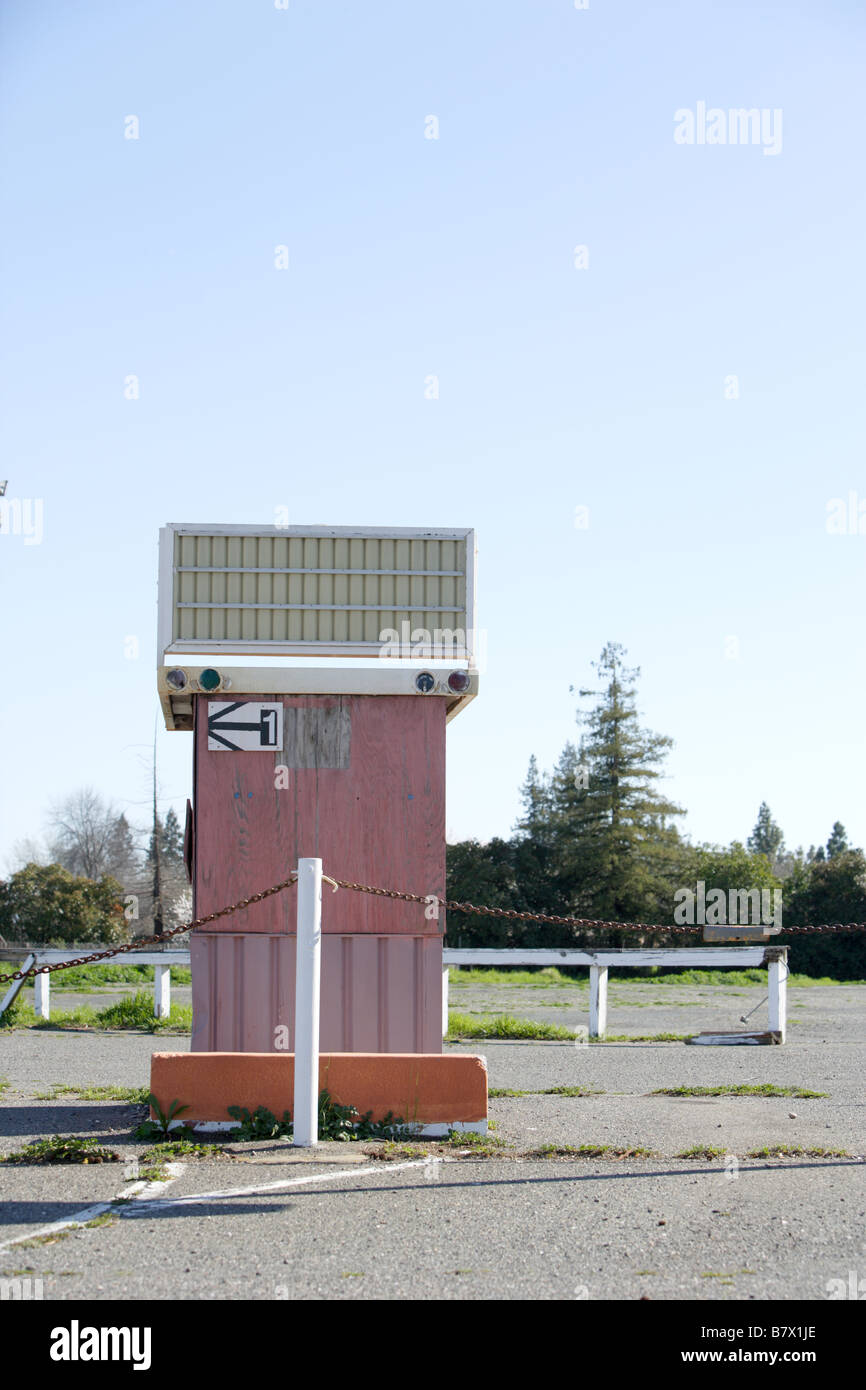 An old drive in movie ticket booth with a blank sign for your text ...