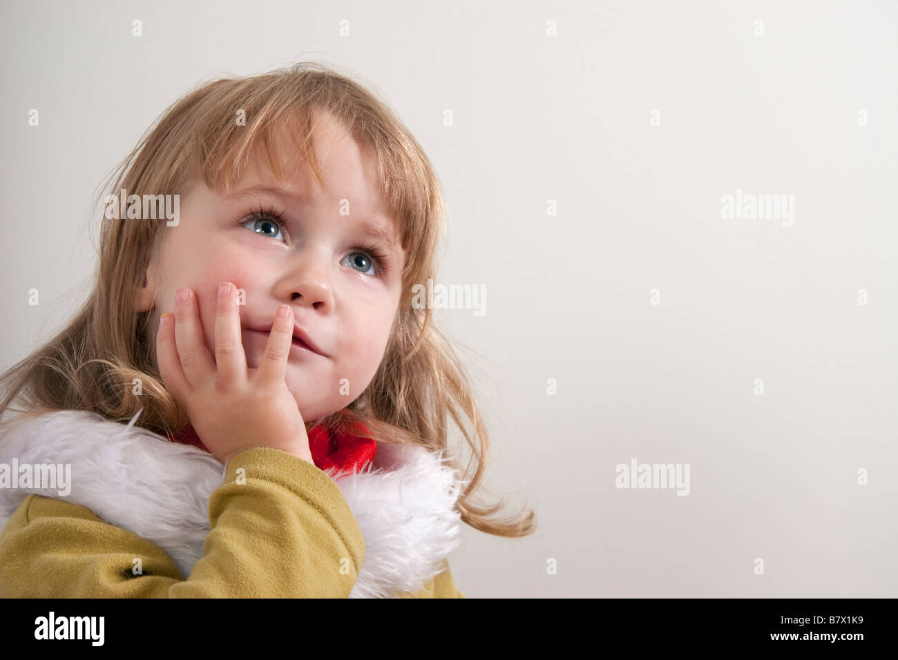 youn cute girl looking upward Stock Photo - Alamy