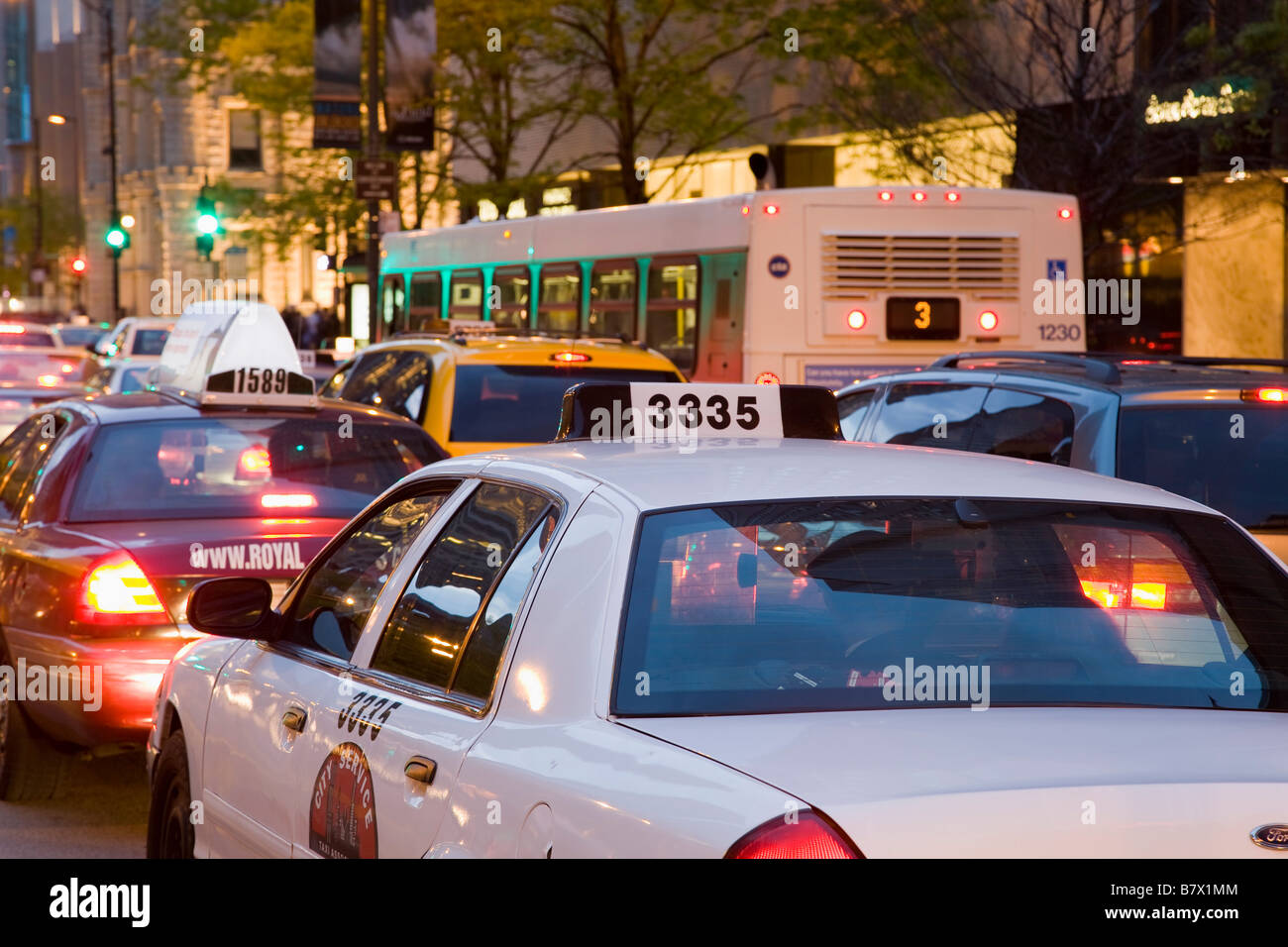 ILLINOIS Chicago Taxis bus and vehicles in bumper to bumper traffic on ...