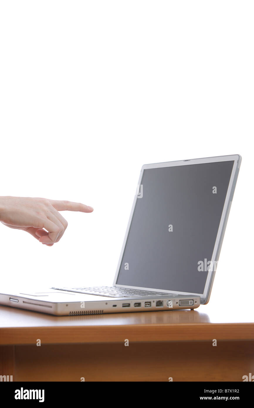 A person pointing at a laptop screen Stock Photo - Alamy