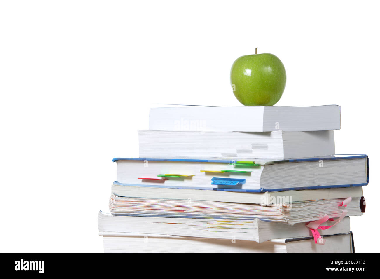 An apple on top of a stack of books Stock Photo - Alamy