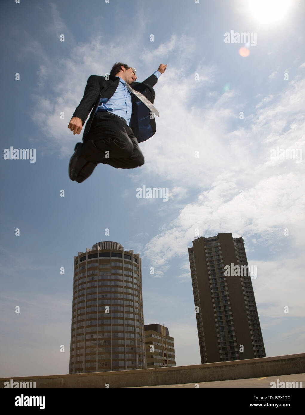 Businessman jumping hi-res stock photography and images - Alamy