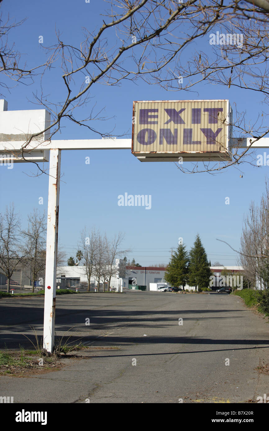 An old Exit only sign in a parking lot Stock Photo - Alamy