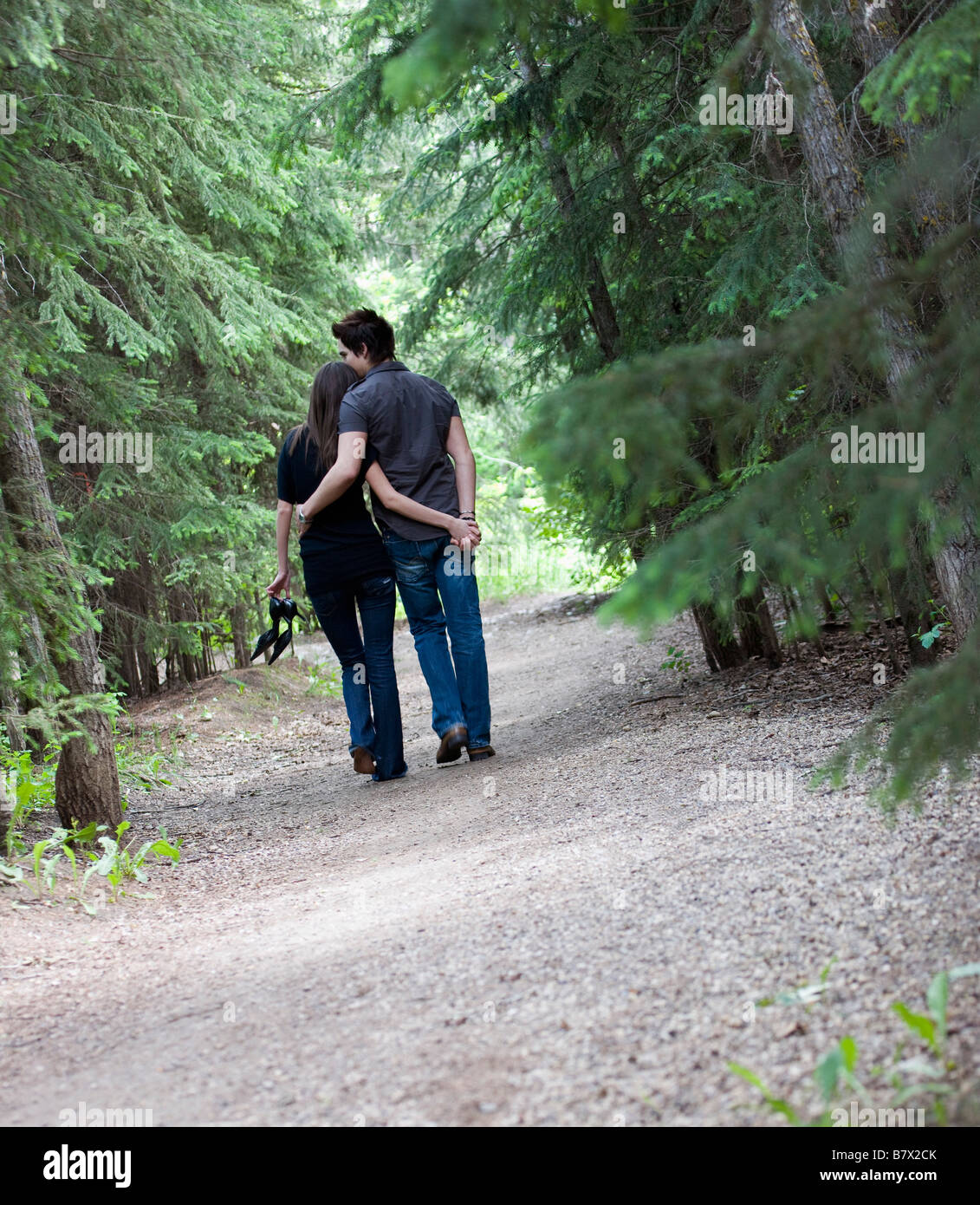 Couple walking together Stock Photo - Alamy