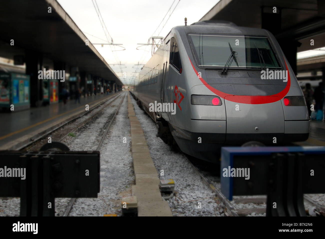 A high speed train in a European train station getting ready to move ...