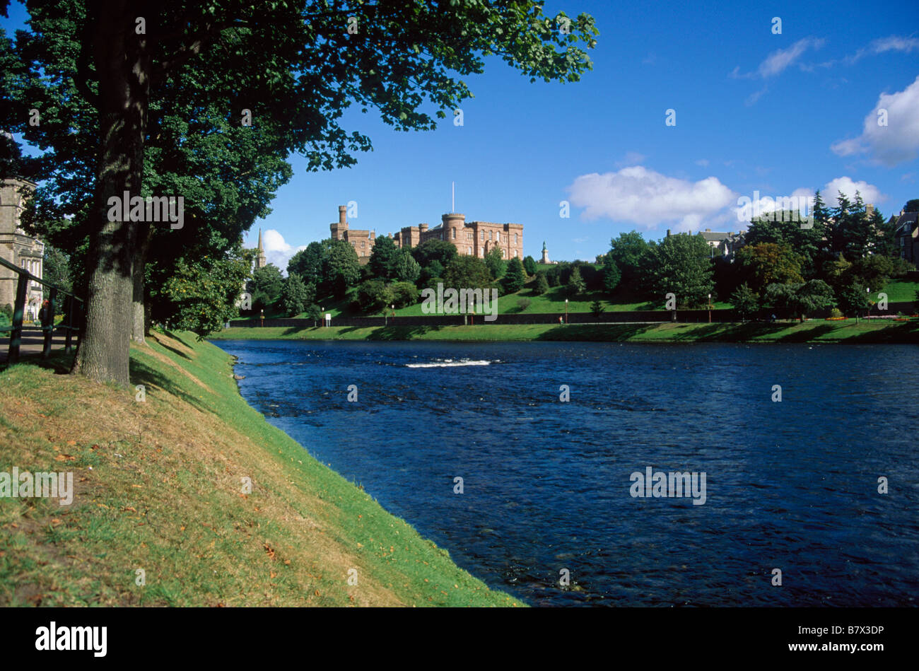 River Ness View of Inverness Castle Grass banks Trees INVERNESS ...