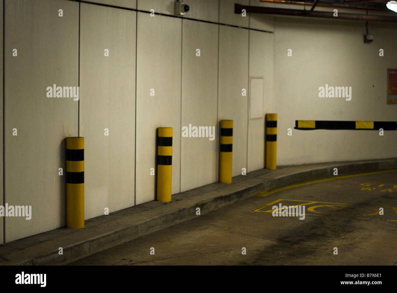 yellow traffic bollards Stock Photo - Alamy