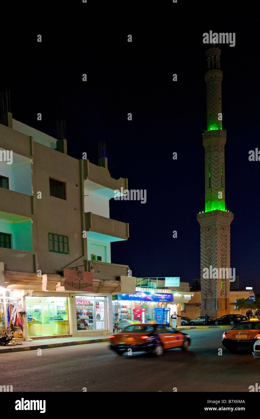 nightscene of busy street with cars and green mosque in egypt Stock ...