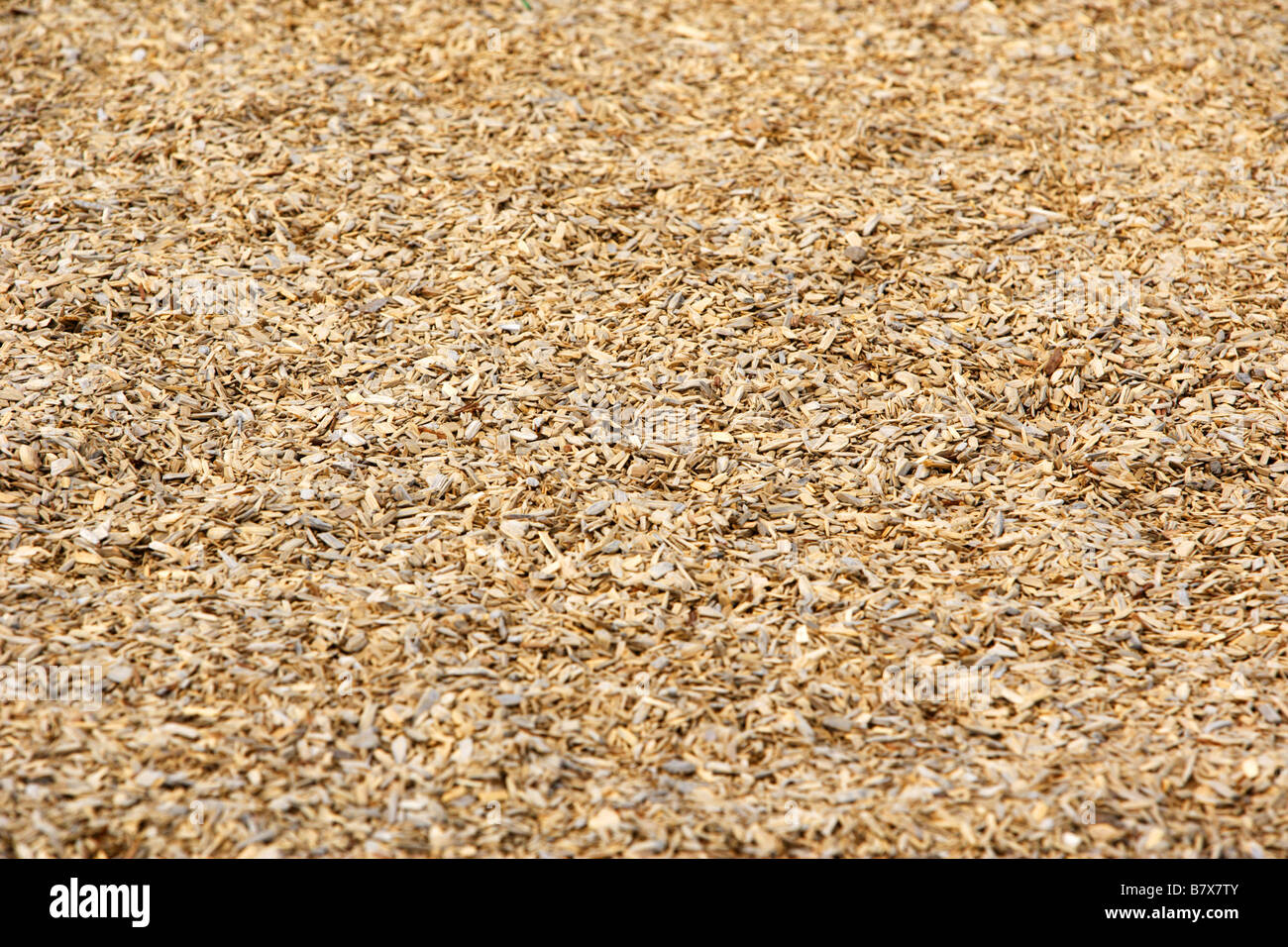Wooden Bark Barkground in a park play area Stock Photo - Alamy