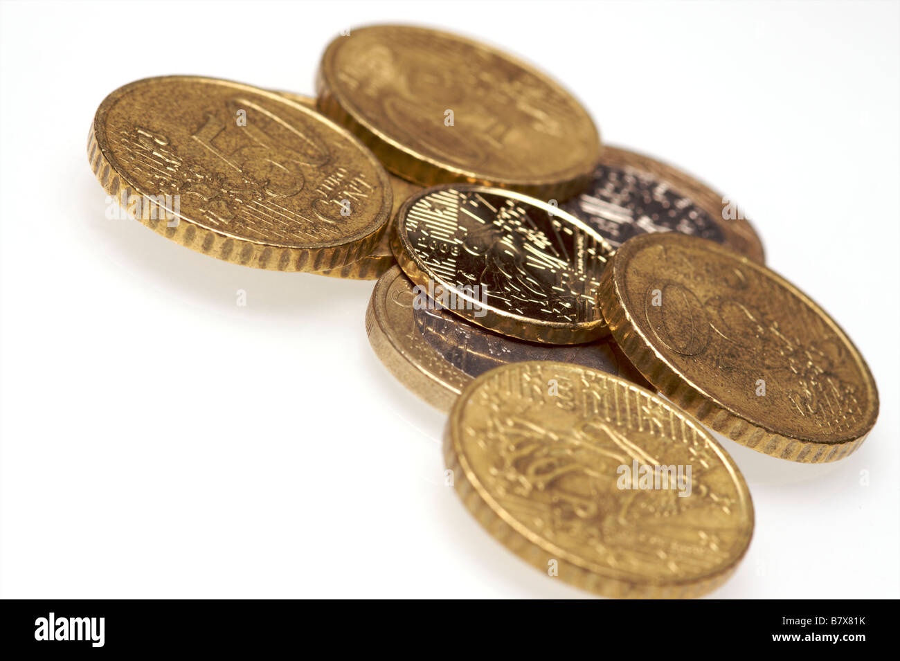 a selection of euro cent coins on a white background Stock Photo - Alamy