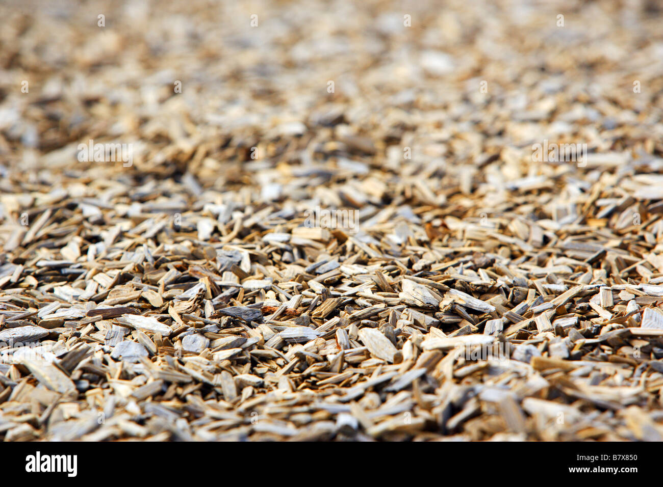 Wooden Bark Barkground in a park play area Stock Photo - Alamy