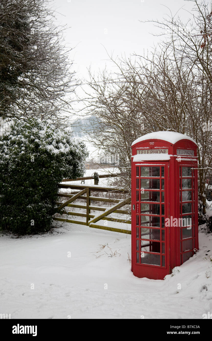UK red telephone box in remote Wiltshire village location covered in ...