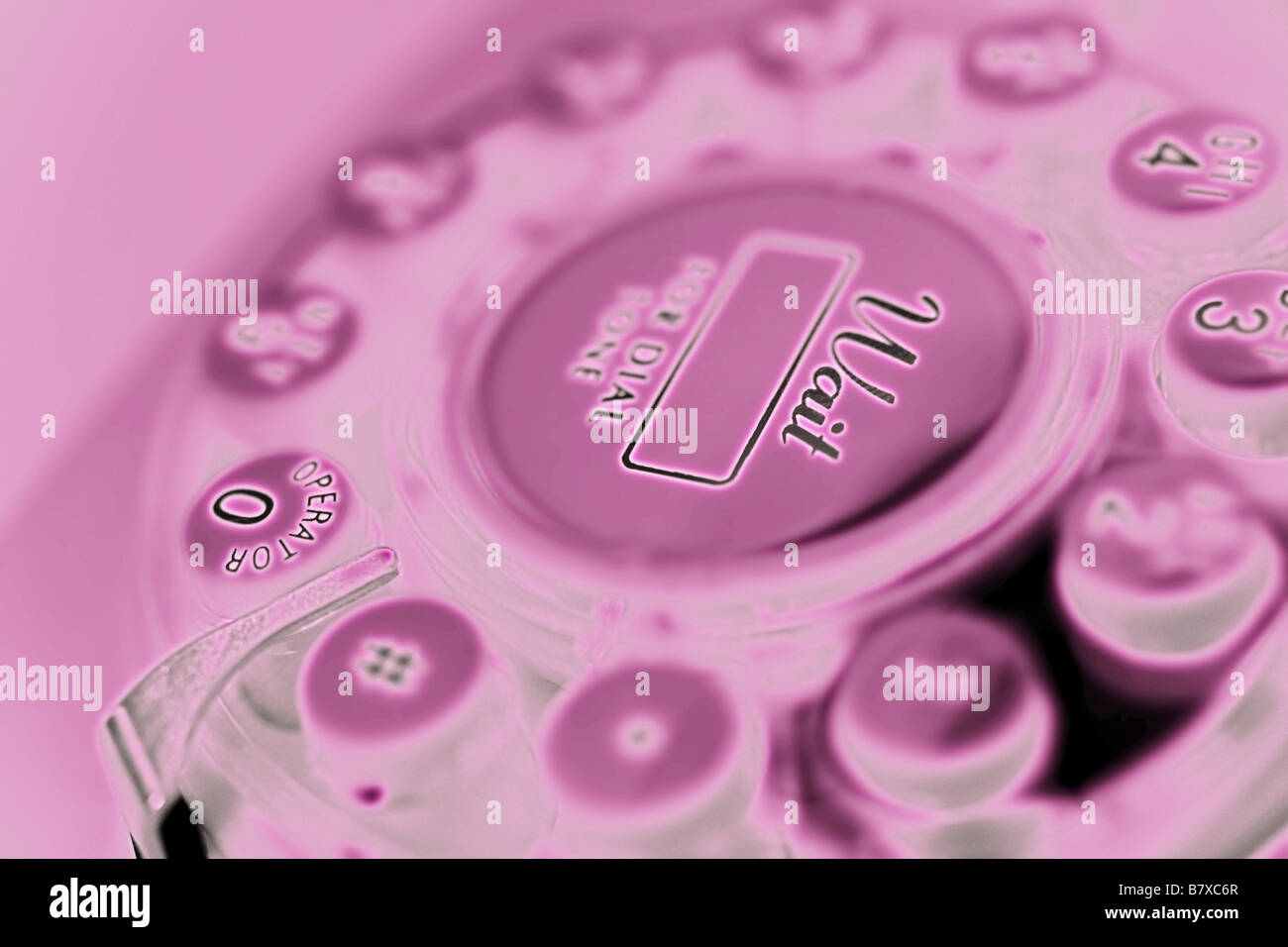 a pink telephone on a pink background with photoshop effects Stock ...