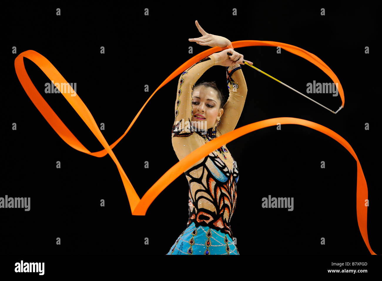 woman doing rhythmic gymnastics with rope Stock Photo - Alamy