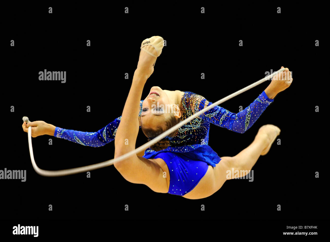 woman doing rhythmic gymnastics with rope Stock Photo - Alamy