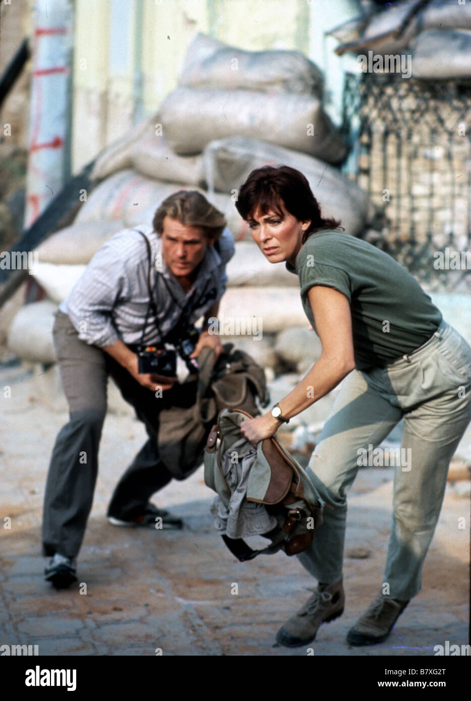 Under Fire Year: 1983 USA Nick Nolte, Joanna Cassidy Director: Roger ...