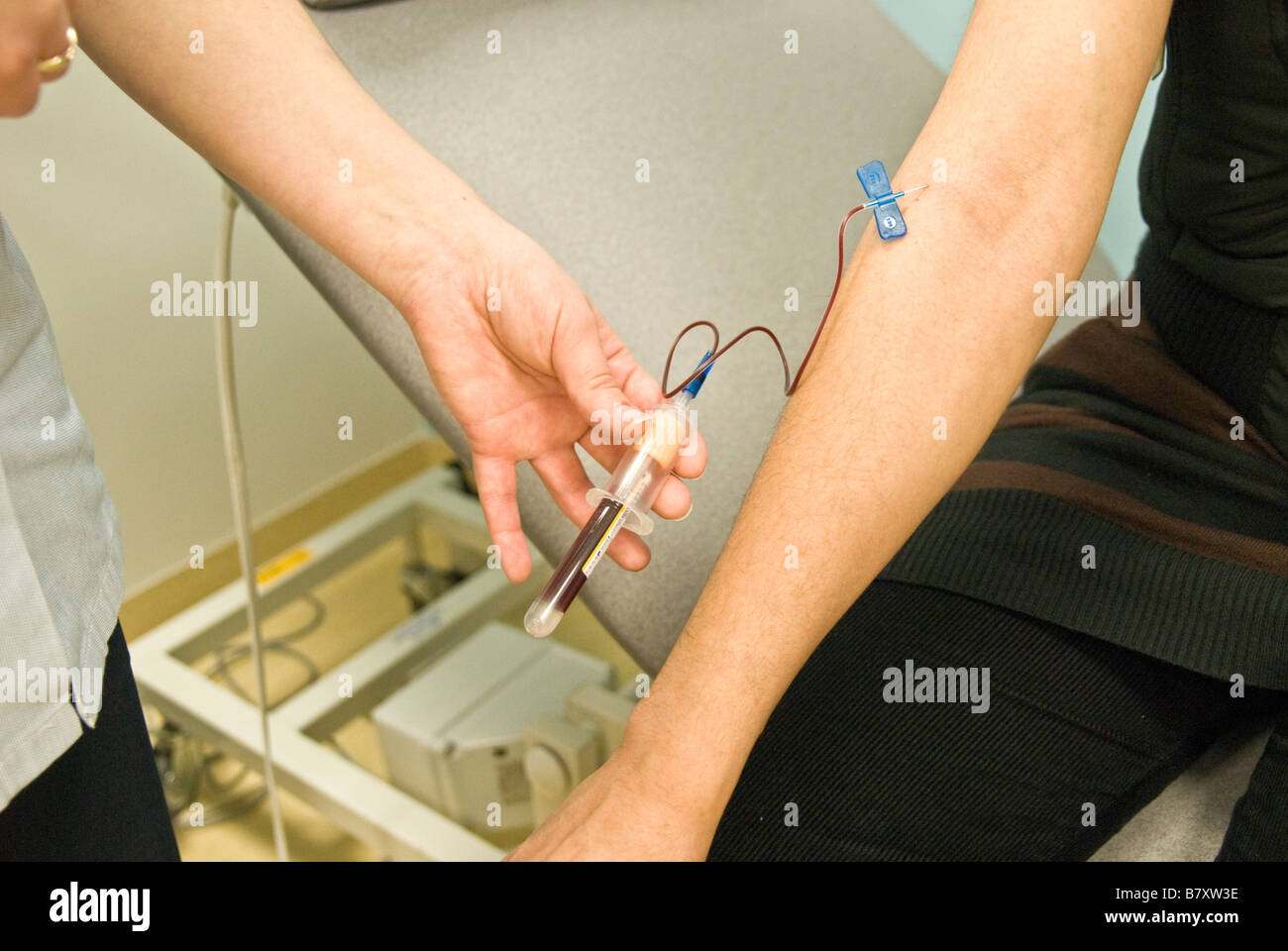 NURSE TAKING BLOOD FROM THE PATIENT Stock Photo - Alamy
