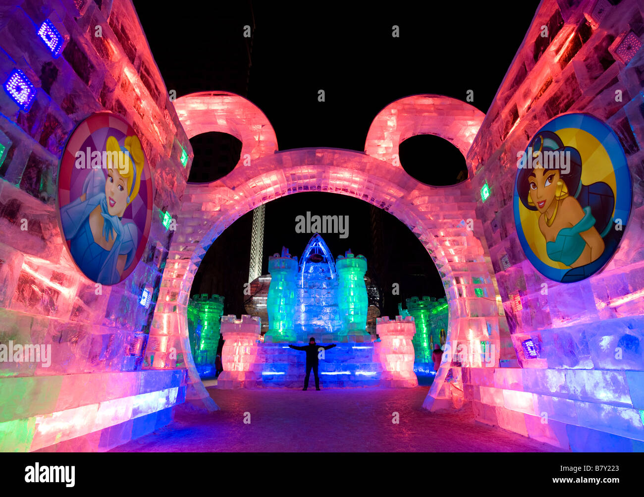 Illuminated Ice sculpture at night in shape of Mickey Mouse at annual ...