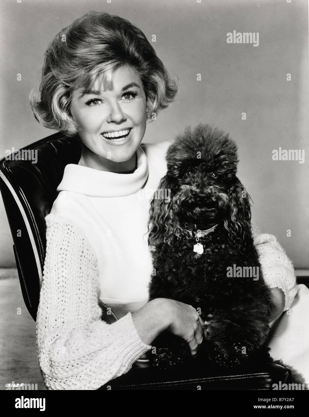 Doris Day with pet poodle Ca 1965 Stock Photo - Alamy