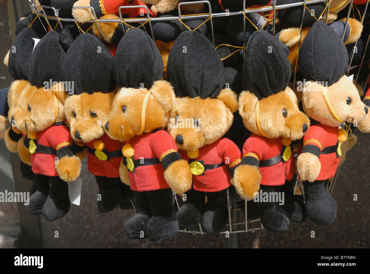 Teddy bears dressed as Guards in red uniforms and busbys Stock Photo ...