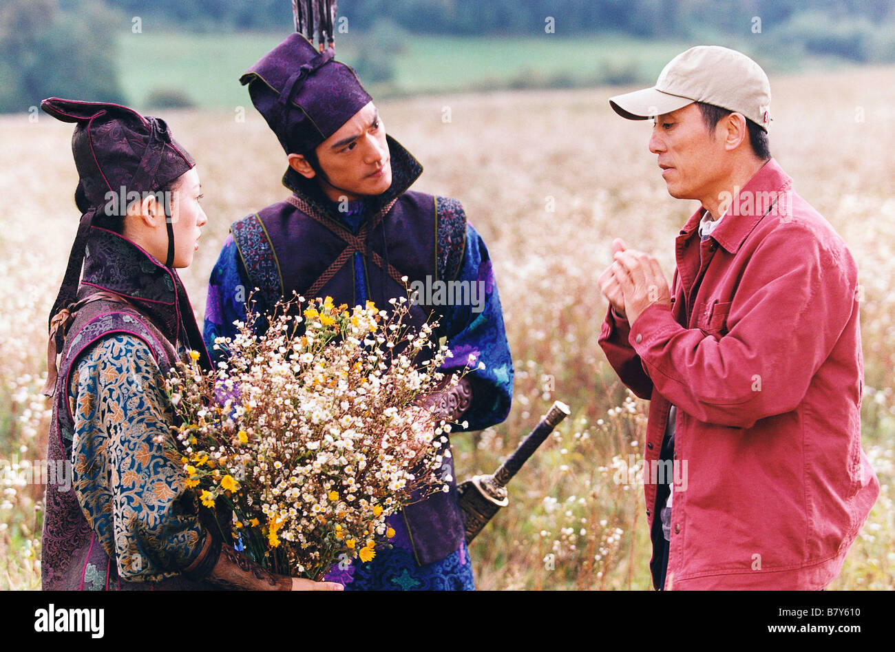 Takeshi Kaneshiro, Zhang Ziyi, Zhang Yimou on the set Shi mian mai fu ...