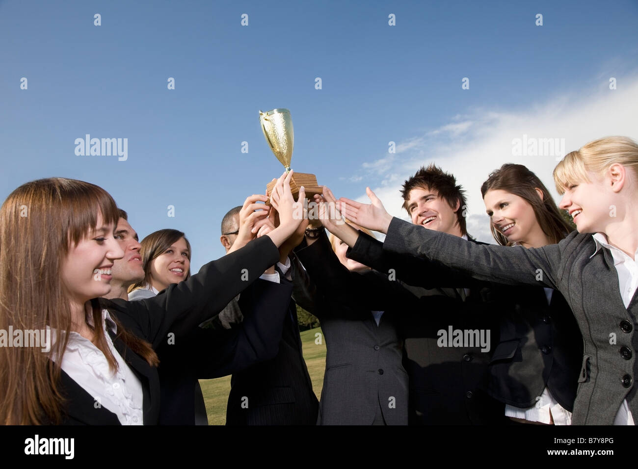 Holding trophies hi-res stock photography and images - Alamy