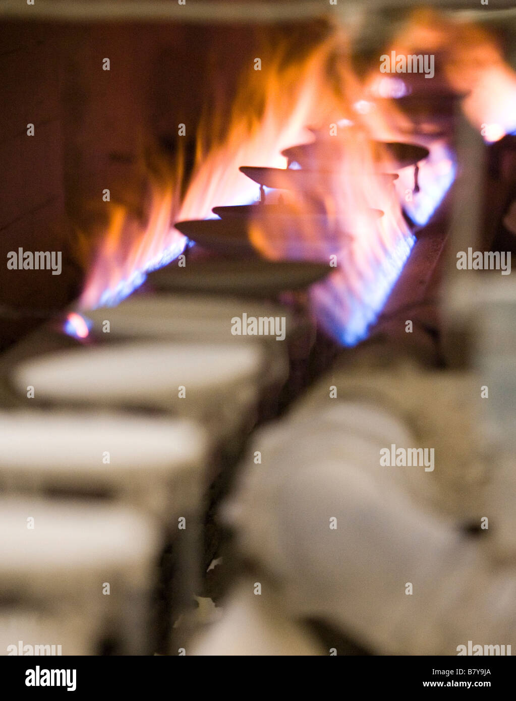 Clay plates enter a blasting furnace at Steelite International factory ...