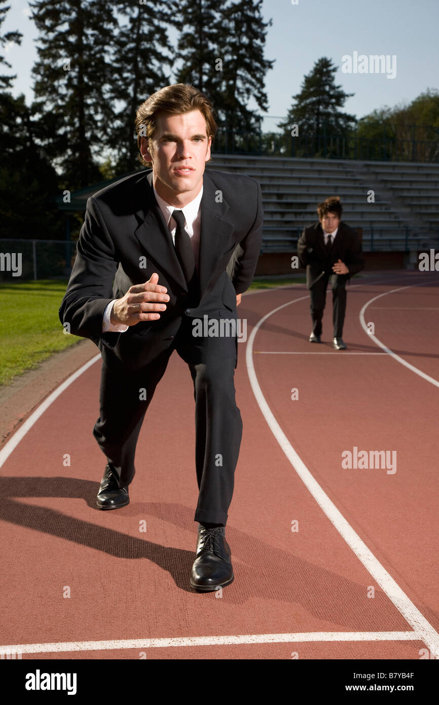 Businessmen on a race track Stock Photo - Alamy