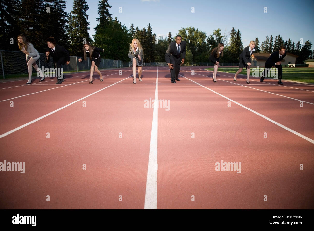 Business-people on a racetrack Stock Photo - Alamy